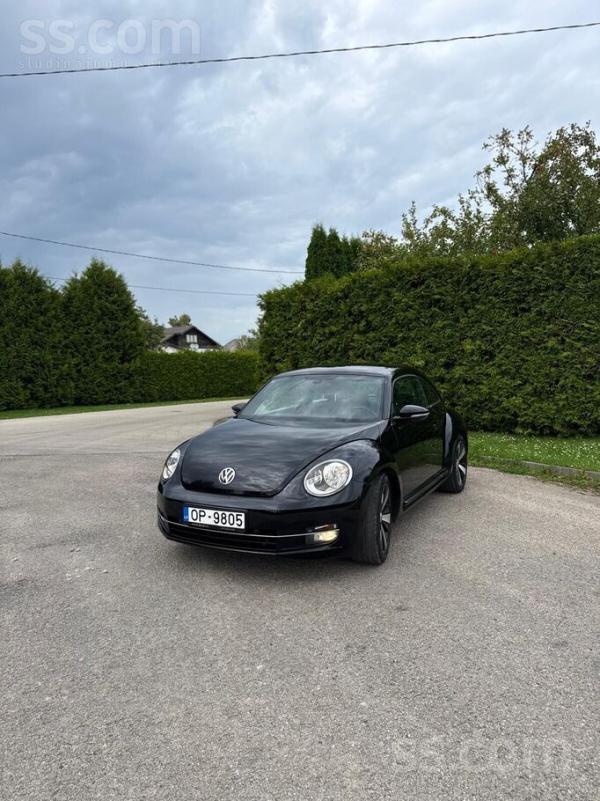 Melns Volkswagen Beetle 2011 Rīga, ar dzinēja tilpumu 2.00 L un nobraukumu 215 tūkst. km par 7900 €, foto 3 vietnē AUTOMOTO.COM.LV