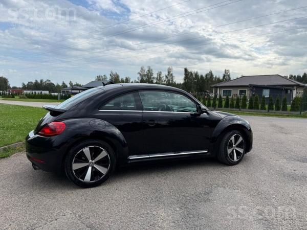 Melns Volkswagen Beetle 2011 Rīga, ar dzinēja tilpumu 2.00 L un nobraukumu 215 tūkst. km par 7900 €, foto 4 vietnē AUTOMOTO.COM.LV