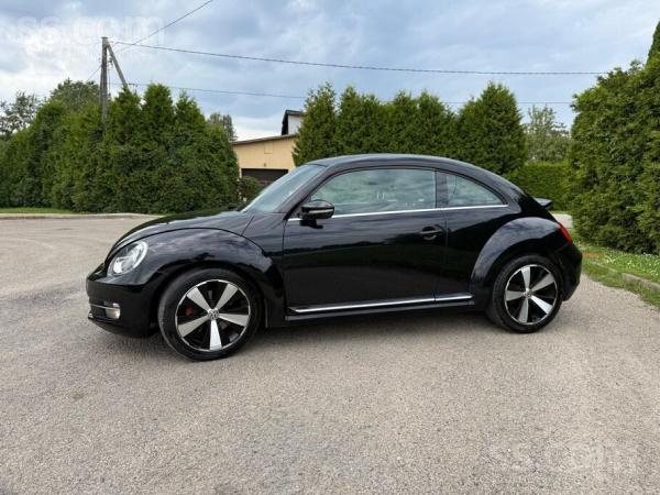 Melns Volkswagen Beetle 2011 Rīga, ar dzinēja tilpumu 2.00 L un nobraukumu 215 tūkst. km par 7900 €, foto 5 vietnē AUTOMOTO.COM.LV