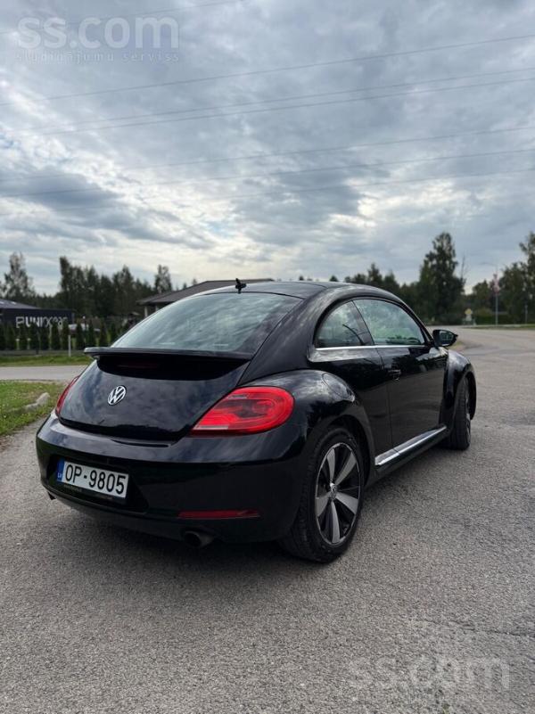 Melns Volkswagen Beetle 2011 Rīga, ar dzinēja tilpumu 2.00 L un nobraukumu 215 tūkst. km par 7900 €, foto 6 vietnē AUTOMOTO.COM.LV