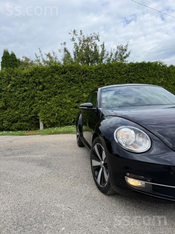 Melns Volkswagen Beetle 2011 Rīga, ar dzinēja tilpumu 2.00 L un nobraukumu 215 tūkst. km par 7900 €, foto 10 vietnē AUTOMOTO.COM.LV