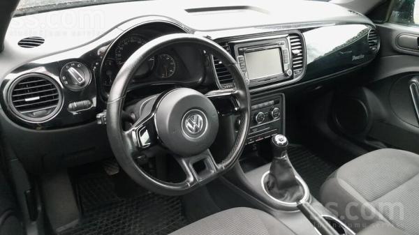 Melns Volkswagen Beetle 2012 Rīga, ar dzinēja tilpumu 1.20 L un nobraukumu 224 tūkst. km par 3800 €, foto 4 vietnē AUTOMOTO.COM.LV