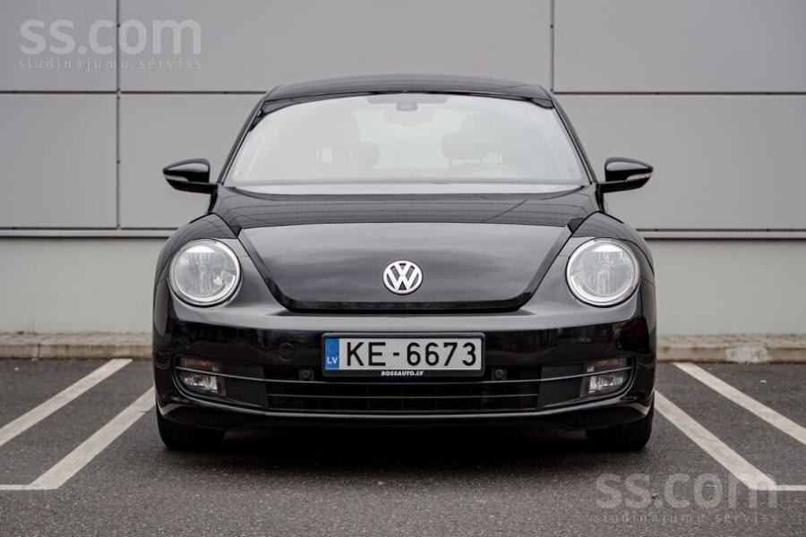Black Volkswagen Beetle 2013 in Riga, with an engine capacity of 1.20 L and mileage of 0 thousand km for 6550 €, photo 2 on AUTOMOTO.COM.LV