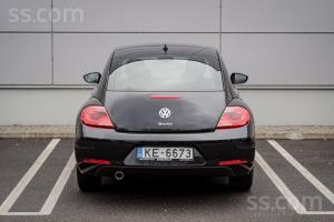 Black Volkswagen Beetle 2013 in Riga, with an engine capacity of 1.20 L and mileage of 0 thousand km for 6550 €, photo 5 on AUTOMOTO.COM.LV