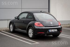 Black Volkswagen Beetle 2013 in Riga, with an engine capacity of 1.20 L and mileage of 0 thousand km for 6550 €, photo 6 on AUTOMOTO.COM.LV