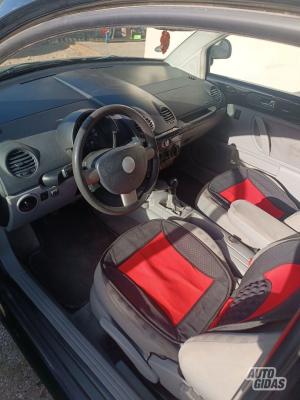 Black Volkswagen Beetle 2001 in Ignalina, with an engine capacity of 2.00 L and mileage of 265 thousand km for 950 €, photo 21 on AUTOMOTO.COM.LV