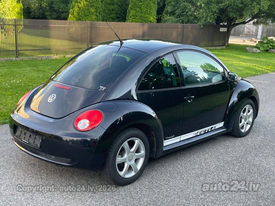 Black Volkswagen Beetle 2009 in Viljandi, with an engine capacity of 1.90 L and mileage of 222 thousand km for 3990 €, photo 5 on AUTOMOTO.COM.LV
