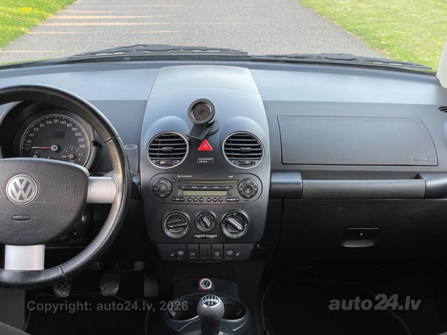 Black Volkswagen Beetle 2009 in Viljandi, with an engine capacity of 1.90 L and mileage of 222 thousand km for 3990 €, photo 9 on AUTOMOTO.COM.LV