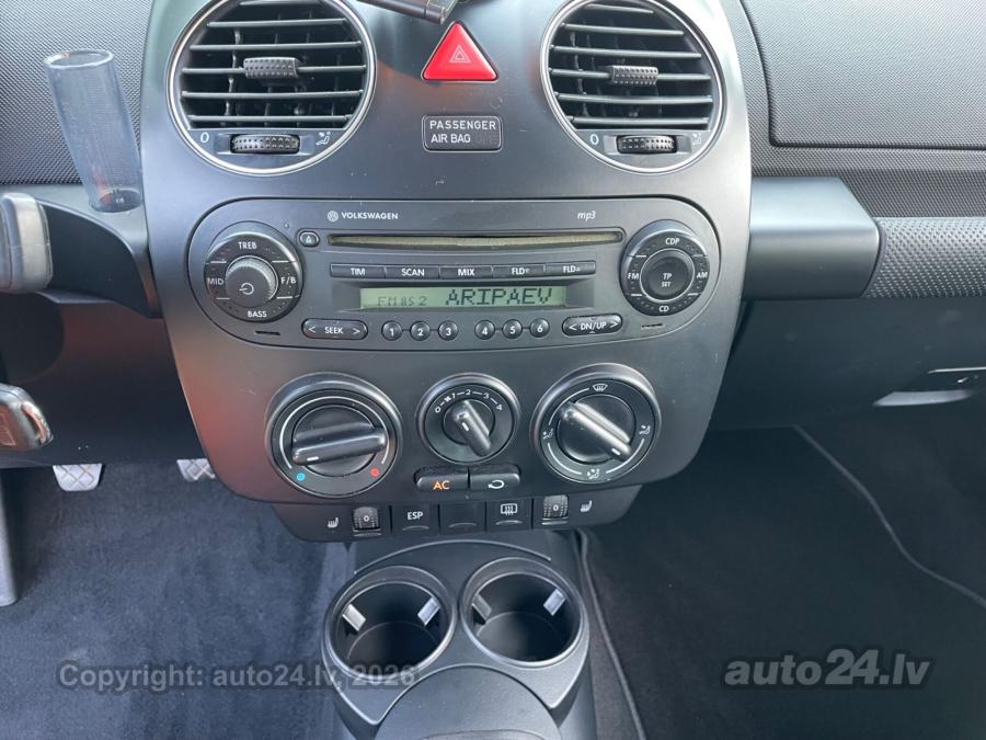 Black Volkswagen Beetle 2009 in Viljandi, with an engine capacity of 1.90 L and mileage of 222 thousand km for 3990 €, photo 10 on AUTOMOTO.COM.LV