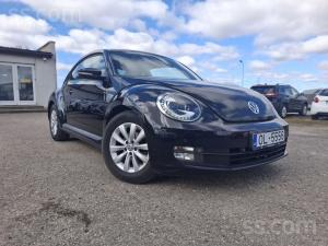Black Volkswagen Beetle 2012 in Talsi, with an engine capacity of 1.20 L and mileage of 189 thousand km for 6900 €, photo  on AUTOMOTO.COM.LV