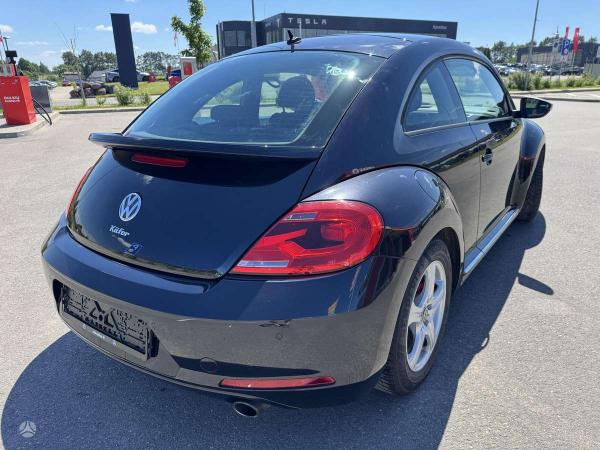Black Volkswagen Beetle 2012 in Vilnius, with an engine capacity of 1.98 L and mileage of 210 thousand km for 6400 €, photo 8 on AUTOMOTO.COM.LV