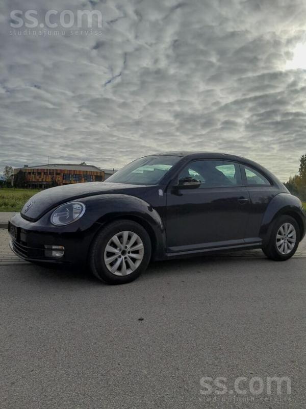Black Volkswagen Beetle 2012 in Riga, with an engine capacity of 1.20 L and mileage of 224 thousand km for 4000 €, photo 2 on AUTOMOTO.COM.LV