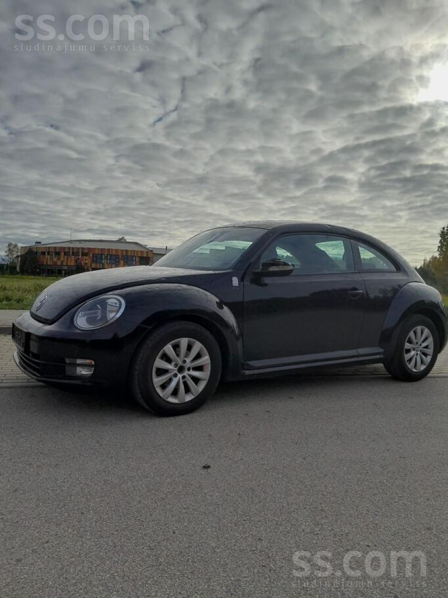 Black Volkswagen Beetle 2012 in Riga, with an engine capacity of 1.20 L and mileage of 224 thousand km for 4000 €, photo 3 on AUTOMOTO.COM.LV