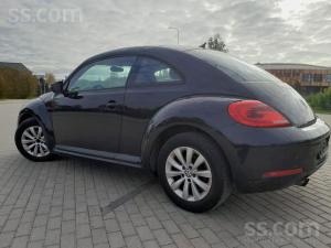 Black Volkswagen Beetle 2012 in Riga, with an engine capacity of 1.20 L and mileage of 224 thousand km for 4000 €, photo 4 on AUTOMOTO.COM.LV