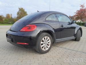 Black Volkswagen Beetle 2012 in Riga, with an engine capacity of 1.20 L and mileage of 224 thousand km for 4000 €, photo 5 on AUTOMOTO.COM.LV