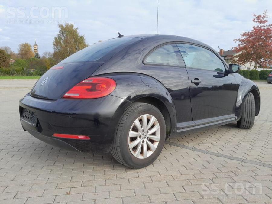 Black Volkswagen Beetle 2012 in Riga, with an engine capacity of 1.20 L and mileage of 224 thousand km for 4000 €, photo 5 on AUTOMOTO.COM.LV