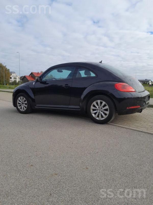 Black Volkswagen Beetle 2012 in Riga, with an engine capacity of 1.20 L and mileage of 224 thousand km for 4000 €, photo 5 on AUTOMOTO.COM.LV