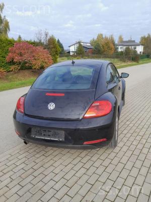Black Volkswagen Beetle 2012 in Riga, with an engine capacity of 1.20 L and mileage of 224 thousand km for 4000 €, photo 7 on AUTOMOTO.COM.LV