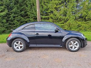 Melns Volkswagen Beetle 2013 Viļņa, ar dzinēja tilpumu 1.40 L un nobraukumu 72 tūkst. km par 7130 €, foto 4 vietnē AUTOMOTO.COM.LV