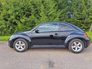Melns Volkswagen Beetle 2013 Viļņa, ar dzinēja tilpumu 1.40 L un nobraukumu 72 tūkst. km par 7130 €, foto 6 vietnē AUTOMOTO.COM.LV