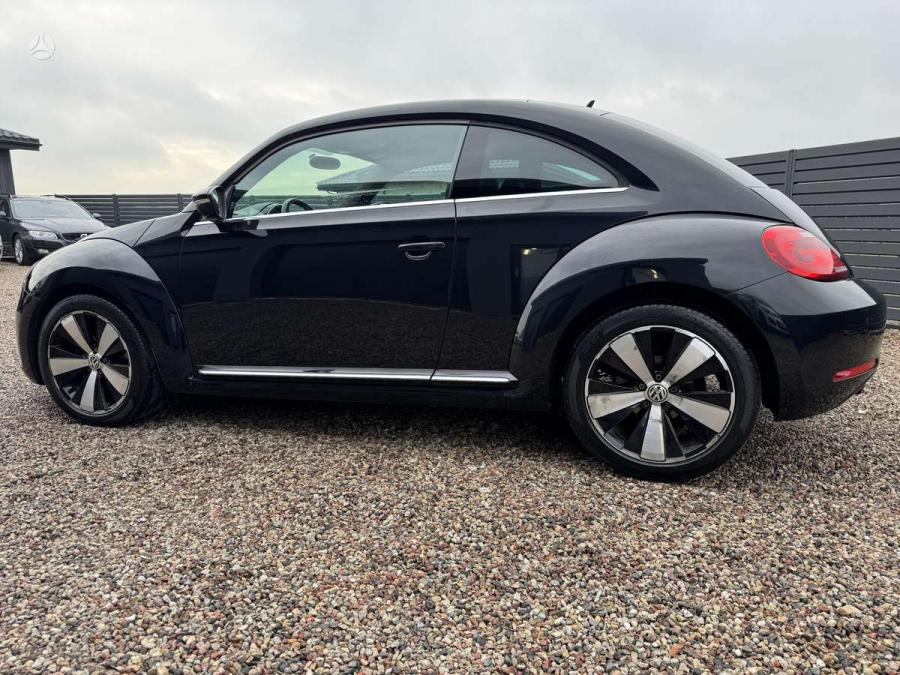 Melns Volkswagen Beetle 2014 Alīta, ar dzinēja tilpumu 1.20 L un nobraukumu 165 tūkst. km par 6250 €, foto 4 vietnē AUTOMOTO.COM.LV