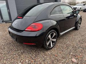 Melns Volkswagen Beetle 2014 Alīta, ar dzinēja tilpumu 1.20 L un nobraukumu 165 tūkst. km par 6250 €, foto 7 vietnē AUTOMOTO.COM.LV