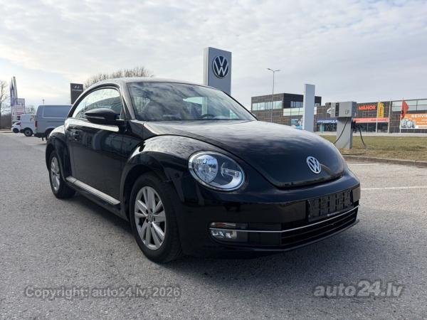 Black Volkswagen Beetle 2014 in Viljandi, with an engine capacity of 1.60 L and mileage of 228 thousand km for 8999 €, photo 1 on AUTOMOTO.COM.LV