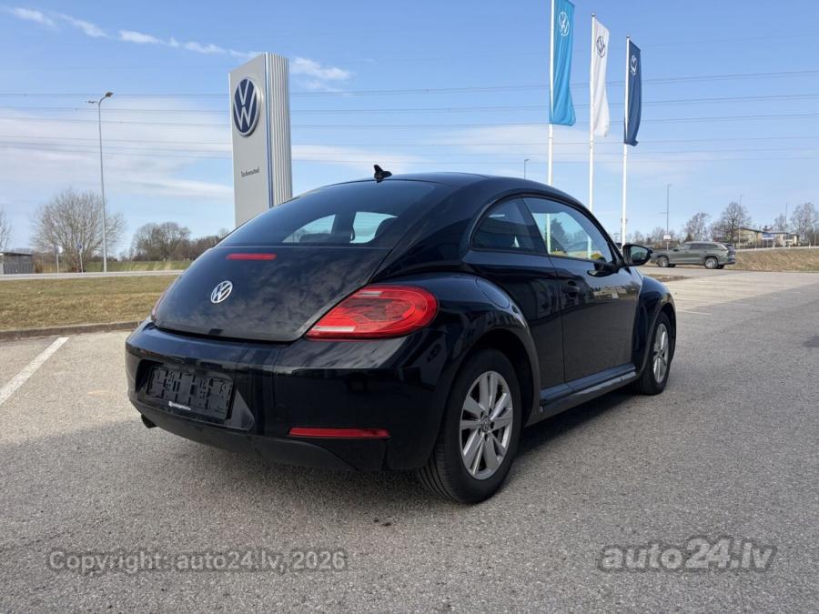 Black Volkswagen Beetle 2014 in Viljandi, with an engine capacity of 1.60 L and mileage of 228 thousand km for 8999 €, photo 3 on AUTOMOTO.COM.LV