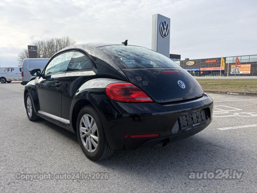 Black Volkswagen Beetle 2014 in Viljandi, with an engine capacity of 1.60 L and mileage of 228 thousand km for 8999 €, photo 4 on AUTOMOTO.COM.LV