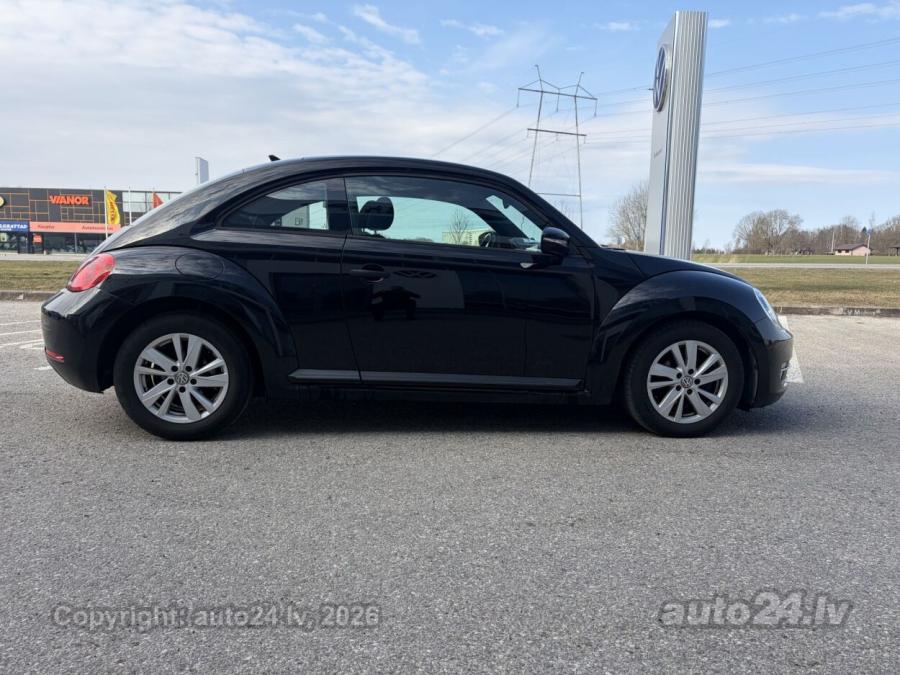 Black Volkswagen Beetle 2014 in Viljandi, with an engine capacity of 1.60 L and mileage of 228 thousand km for 8999 €, photo 16 on AUTOMOTO.COM.LV