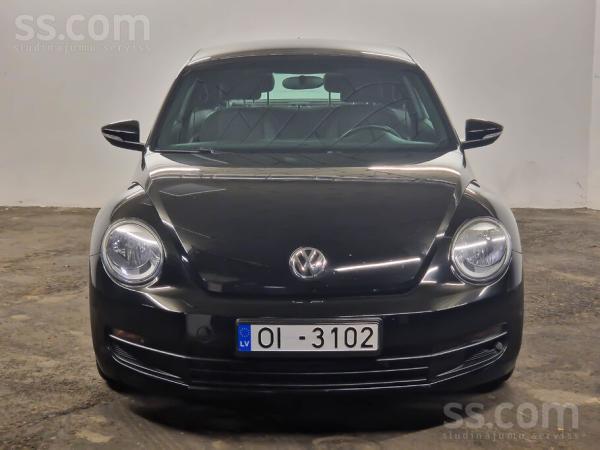 Black Volkswagen Beetle 2014 in Riga, with an engine capacity of 1.20 L and mileage of 230 thousand km for 4850 €, photo 2 on AUTOMOTO.COM.LV