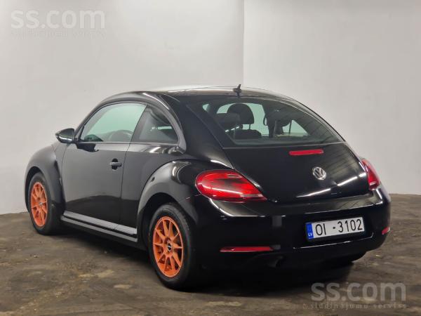 Black Volkswagen Beetle 2014 in Riga, with an engine capacity of 1.20 L and mileage of 230 thousand km for 4850 €, photo 8 on AUTOMOTO.COM.LV