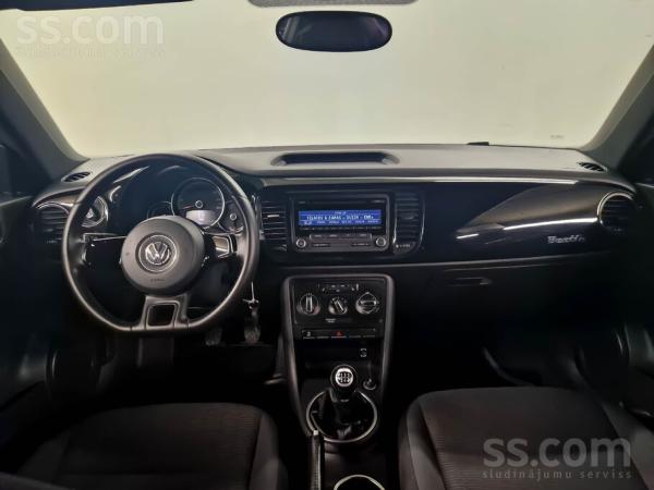 Black Volkswagen Beetle 2014 in Riga, with an engine capacity of 1.20 L and mileage of 230 thousand km for 4850 €, photo 9 on AUTOMOTO.COM.LV