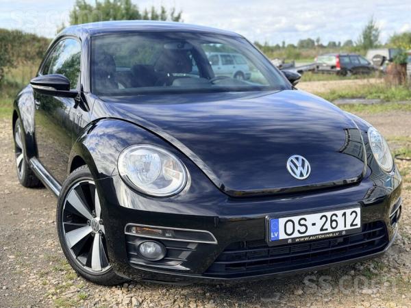 Melns Volkswagen Beetle 2014 Rīga, ar dzinēja tilpumu 2.00 L un nobraukumu 241 tūkst. km par 7995 €, foto 1 vietnē AUTOMOTO.COM.LV