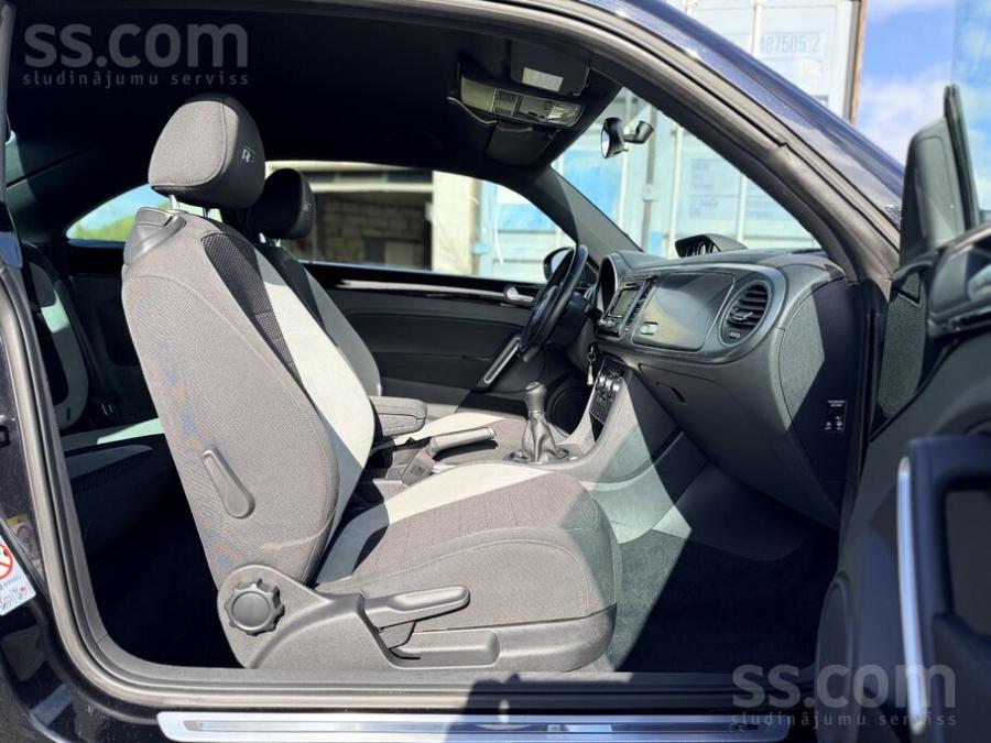 Melns Volkswagen Beetle 2014 Rīga, ar dzinēja tilpumu 2.00 L un nobraukumu 241 tūkst. km par 7995 €, foto 18 vietnē AUTOMOTO.COM.LV