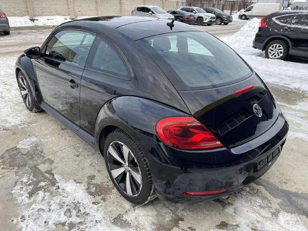 Melns Volkswagen Beetle 2015 Klaipėda, ar dzinēja tilpumu 1.20 L un nobraukumu 158 tūkst. km par 4200 €, foto 2 vietnē AUTOMOTO.COM.LV