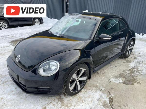 Black Volkswagen Beetle 2015 in Klaipeda, with an engine capacity of 1.20 L and mileage of 158 thousand km for 3900 €, photo 1 on AUTOMOTO.COM.LV