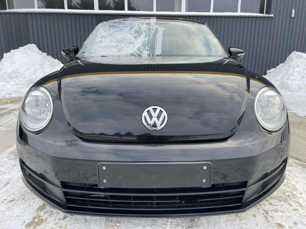 Black Volkswagen Beetle 2015 in Klaipeda, with an engine capacity of 1.20 L and mileage of 158 thousand km for 3900 €, photo 6 on AUTOMOTO.COM.LV