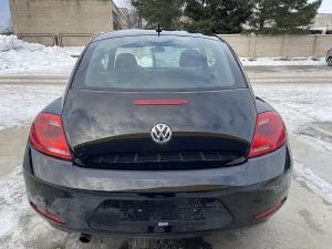 Black Volkswagen Beetle 2015 in Klaipeda, with an engine capacity of 1.20 L and mileage of 158 thousand km for 3900 €, photo 3 on AUTOMOTO.COM.LV