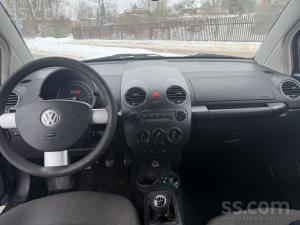 Blue Volkswagen Beetle 2007 in Ogre, with an engine capacity of 1.90 L and mileage of 290 thousand km for 1500 €, photo 6 on AUTOMOTO.COM.LV