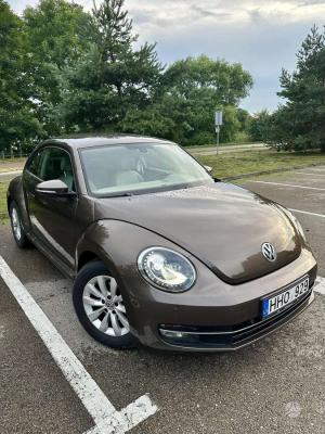 Brown Volkswagen Beetle 2014 in Vilnius, with an engine capacity of 1.20 L and mileage of 116 thousand km for 9999 €, photo  on AUTOMOTO.COM.LV