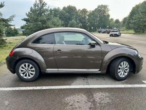 Brown Volkswagen Beetle 2014 in Vilnius, with an engine capacity of 1.20 L and mileage of 116 thousand km for 9999 €, photo 3 on AUTOMOTO.COM.LV