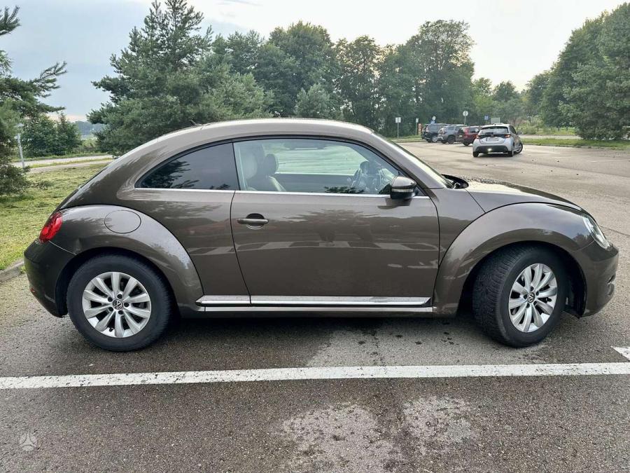 Brown Volkswagen Beetle 2014 in Vilnius, with an engine capacity of 1.20 L and mileage of 116 thousand km for 9999 €, photo 3 on AUTOMOTO.COM.LV