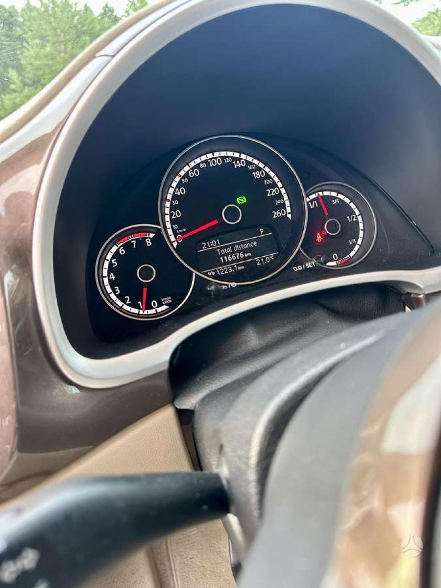 Brown Volkswagen Beetle 2014 in Vilnius, with an engine capacity of 1.20 L and mileage of 116 thousand km for 9999 €, photo 9 on AUTOMOTO.COM.LV