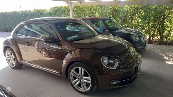 Brown Volkswagen Beetle 2012 in Kaunas, with an engine capacity of 1.60 L and mileage of 165 thousand km for 7500 €, photo 3 on AUTOMOTO.COM.LV