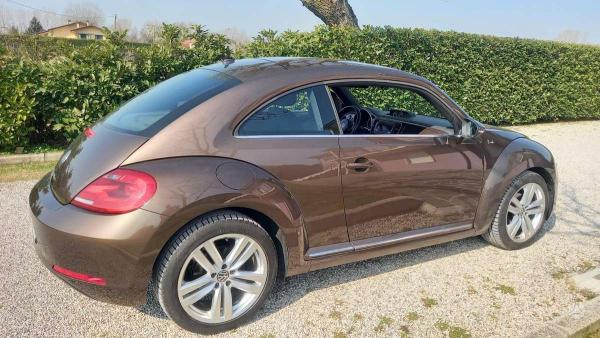Brown Volkswagen Beetle 2012 in Kaunas, with an engine capacity of 1.60 L and mileage of 165 thousand km for 7500 €, photo 5 on AUTOMOTO.COM.LV