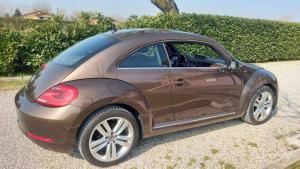 Brown Volkswagen Beetle 2012 in Kaunas, with an engine capacity of 1.60 L and mileage of 165 thousand km for 7500 €, photo 5 on AUTOMOTO.COM.LV