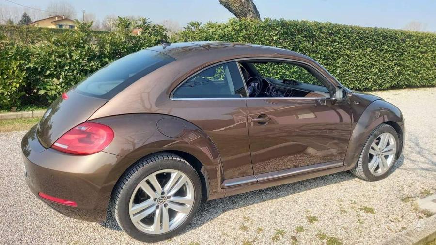 Brown Volkswagen Beetle 2012 in Kaunas, with an engine capacity of 1.60 L and mileage of 165 thousand km for 7500 €, photo 5 on AUTOMOTO.COM.LV