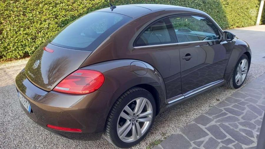 Brown Volkswagen Beetle 2012 in Kaunas, with an engine capacity of 1.60 L and mileage of 165 thousand km for 7500 €, photo 9 on AUTOMOTO.COM.LV