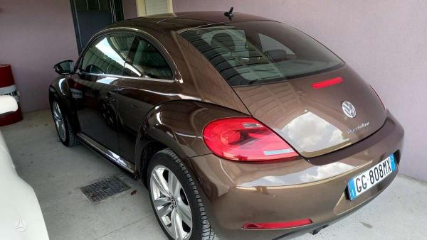 Brown Volkswagen Beetle 2012 in Kaunas, with an engine capacity of 1.60 L and mileage of 165 thousand km for 7500 €, photo 10 on AUTOMOTO.COM.LV